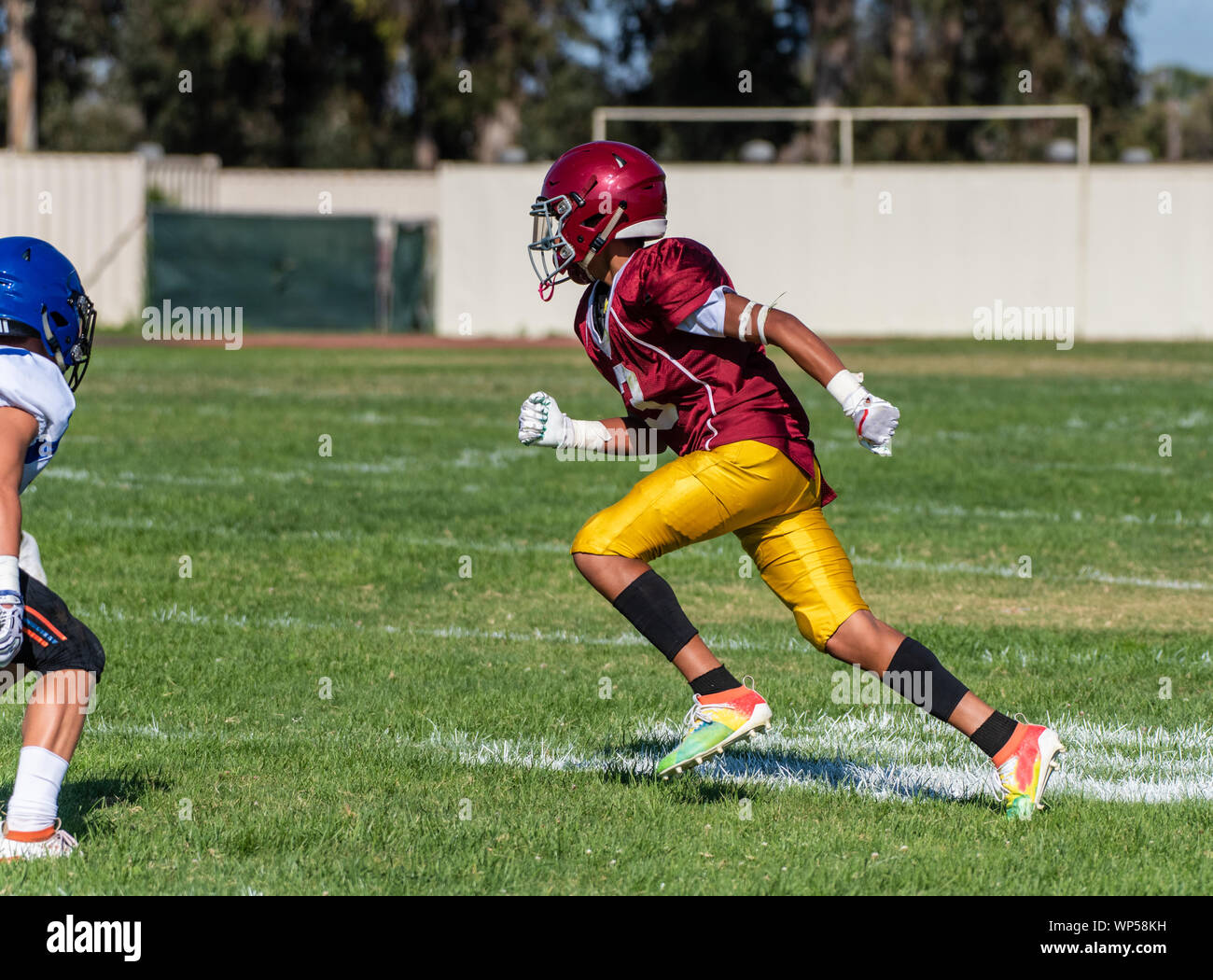 Boys play football on field hi-res stock photography and images - Alamy
