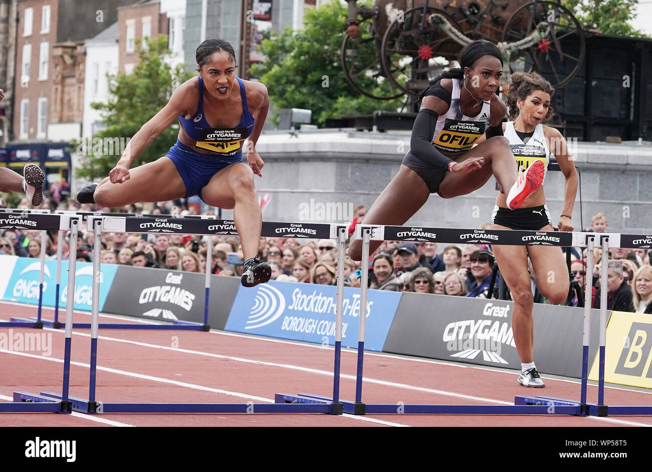 Winner of the 100m hurdles USA'S Queen Clay (left) and Great Britain's ...