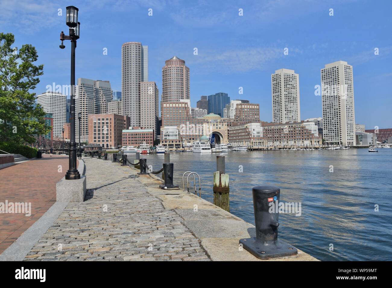 The downtown Boston skyline as seen from the Fan Pier Harbor Walk in ...