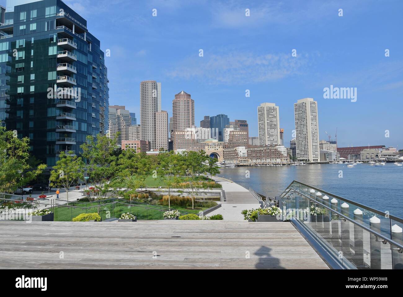 The downtown Boston skyline as seen from the Fan Pier Harbor Walk in ...