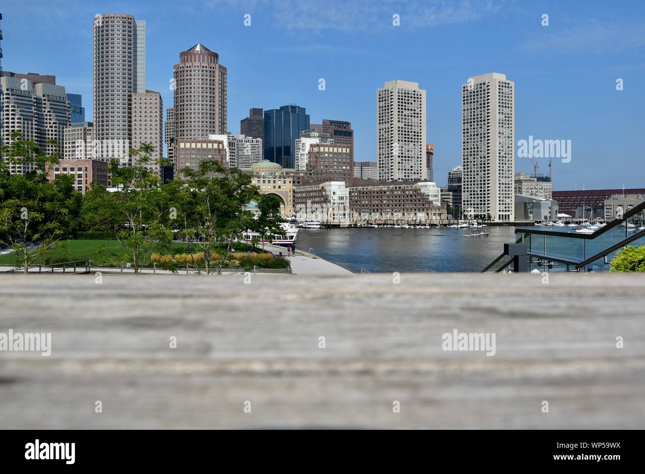The downtown Boston skyline as seen from the Fan Pier Harbor Walk in ...