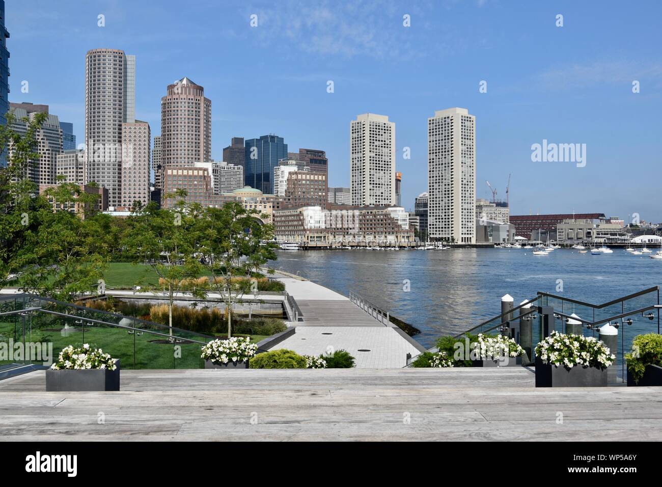 The downtown Boston skyline as seen from the Fan Pier Harbor Walk in ...