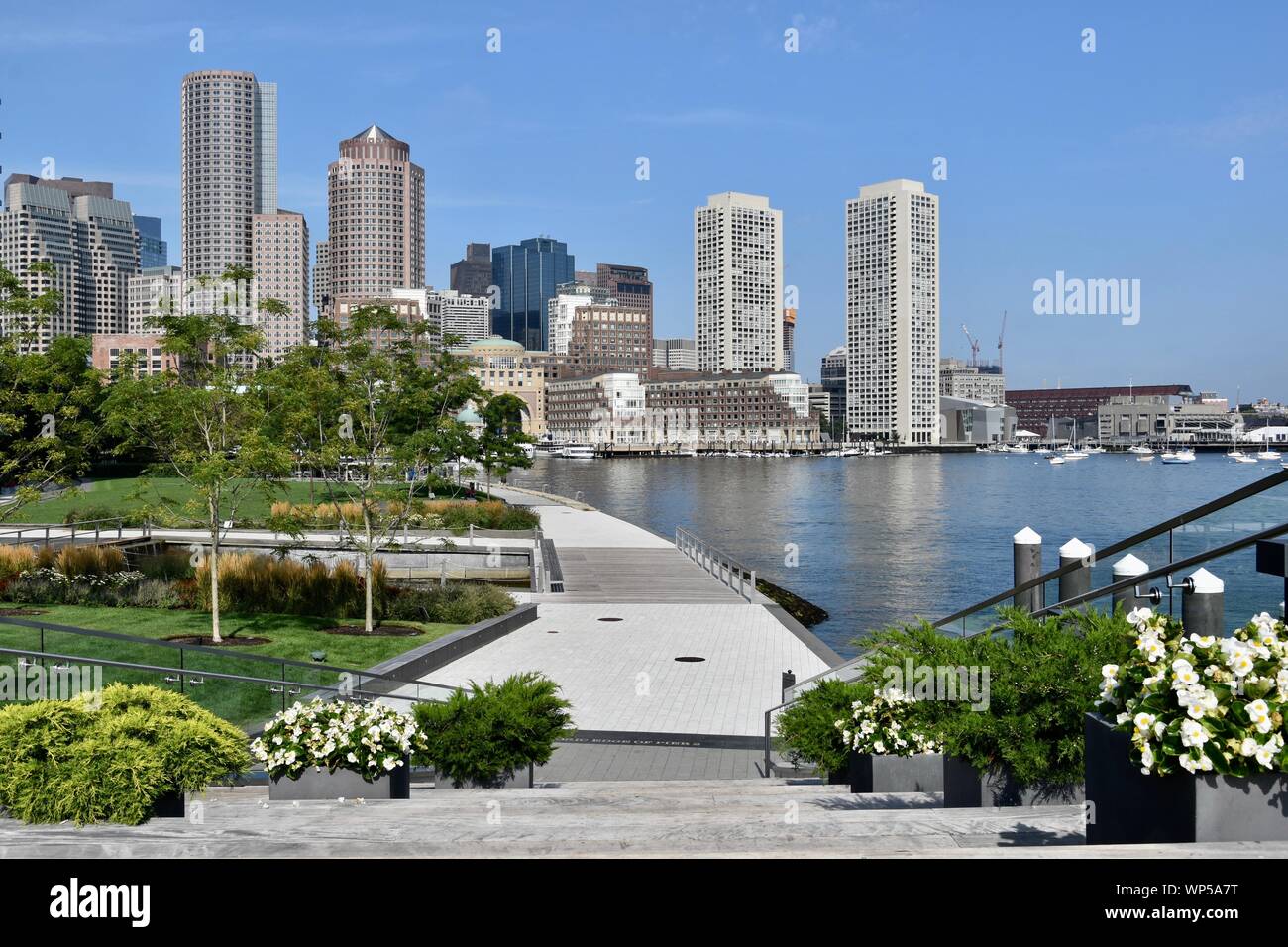 The downtown Boston skyline as seen from the Fan Pier Harbor Walk in ...