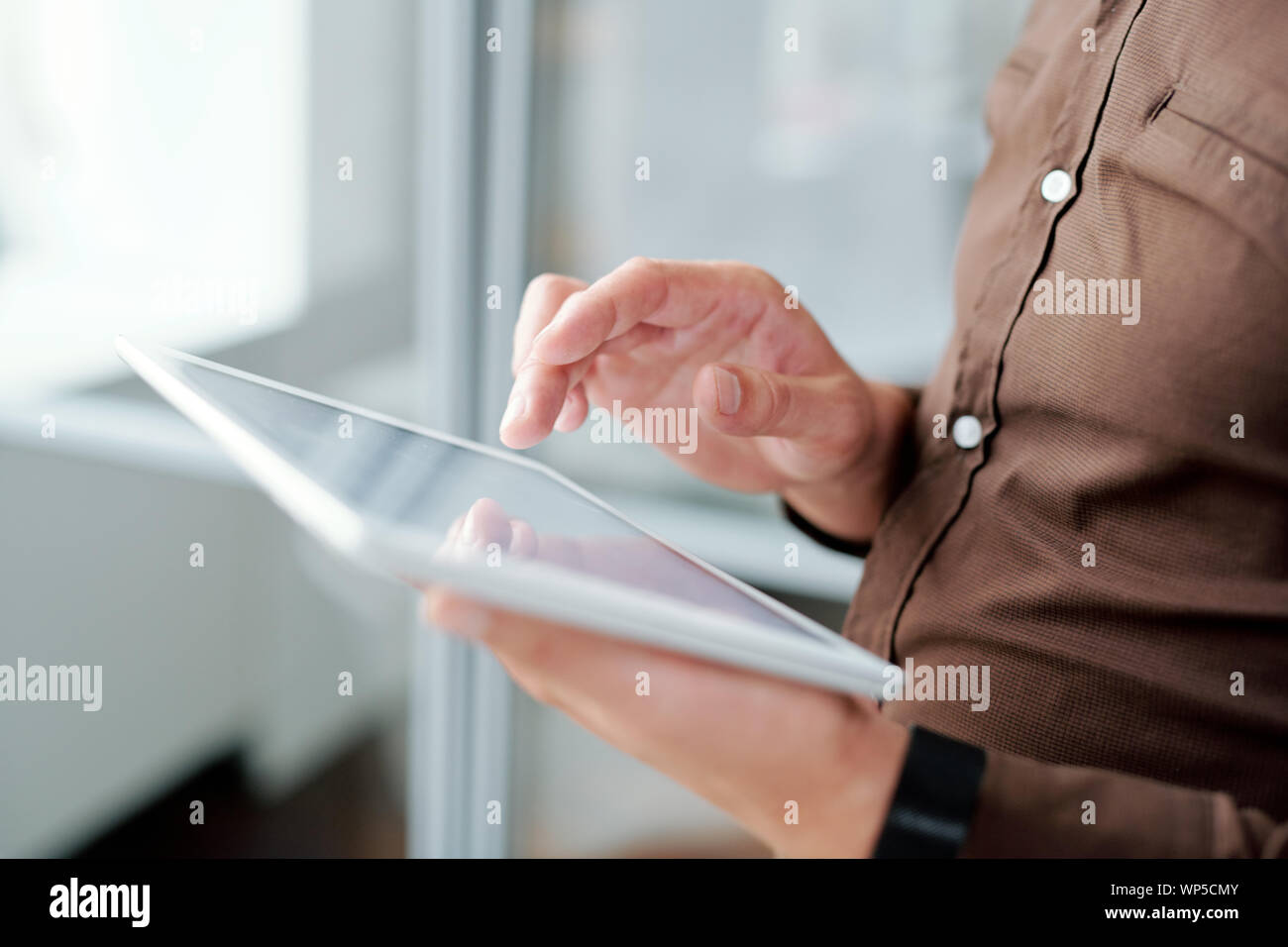 Person touching digital screen hi-res stock photography and images - Alamy