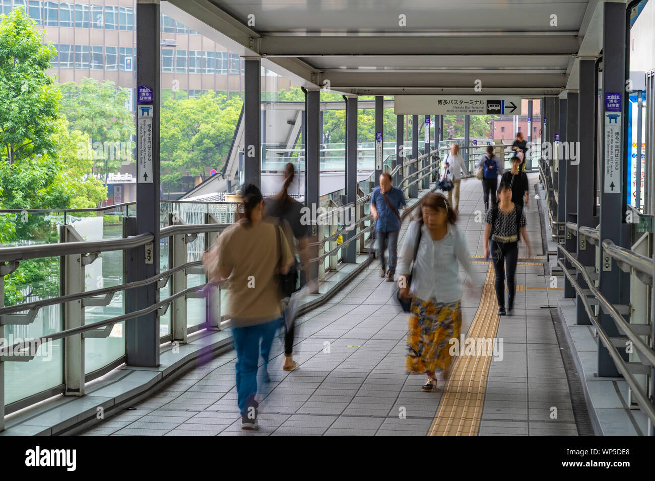 Fukuoka, Japan - 13 July 2019 - Pedestrians walk on the pedestrian ...