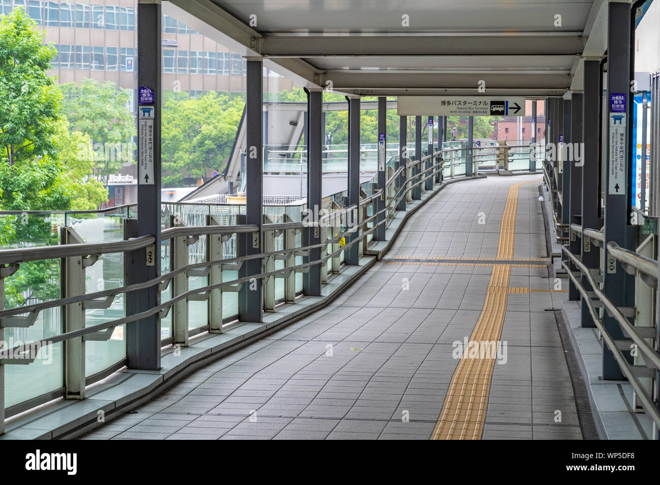 Fukuoka, Japan - 13 July 2019 - Pedestrians walk on the pedestrian ...