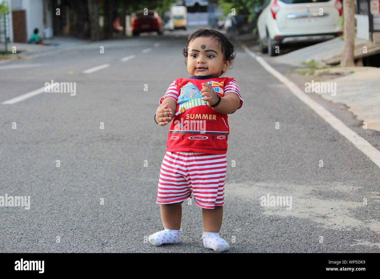 Boy on the road Stock Photo - Alamy