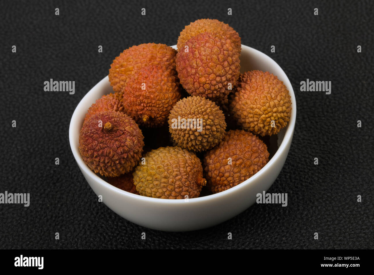 Tropical fruit lychee in the bowl Stock Photo - Alamy