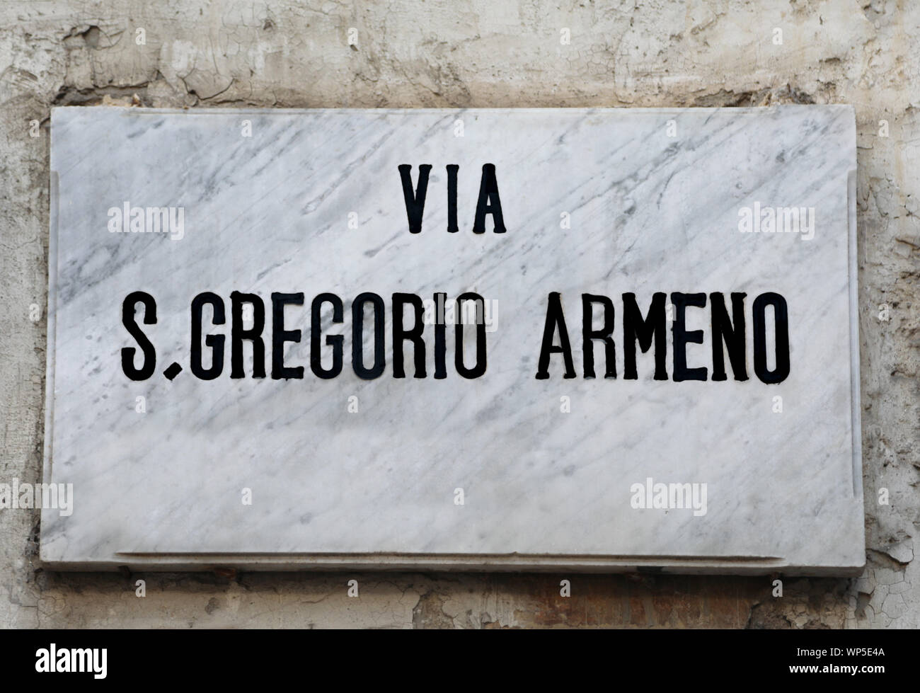 street name of Naples in Italy called VIA S GREGORIO ARMENO the famous ...