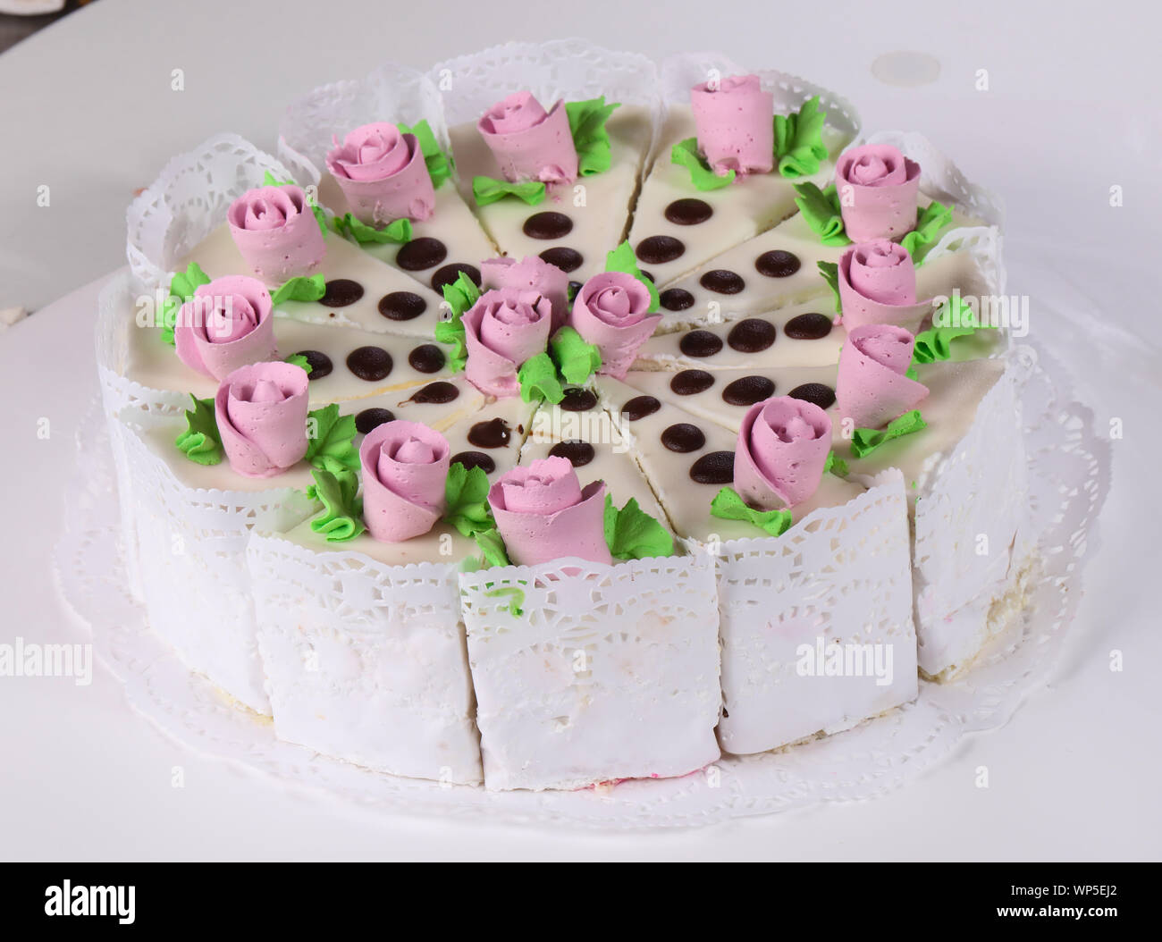 Tasty Cake with cream flowers Stock Photo - Alamy
