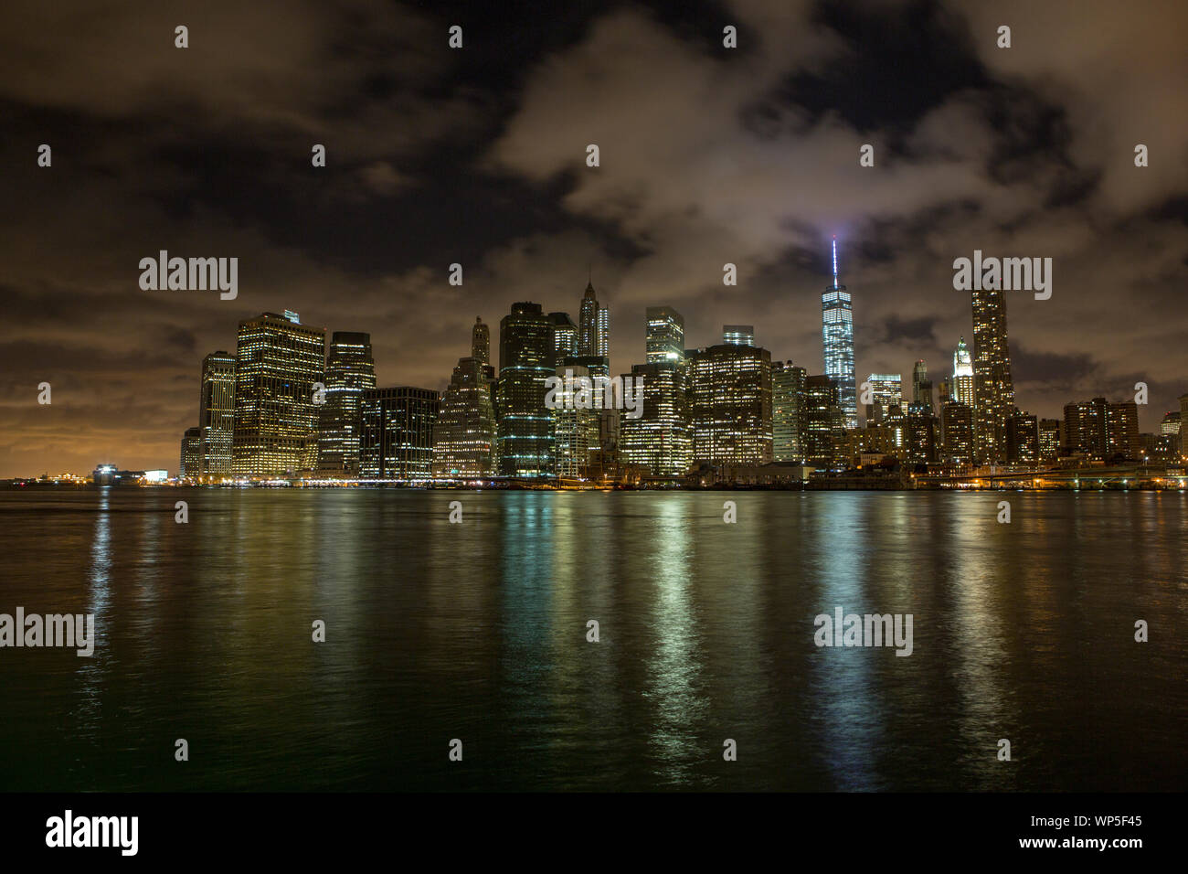 New York cityscape at night as seen from Brooklyn, New York Stock Photo ...