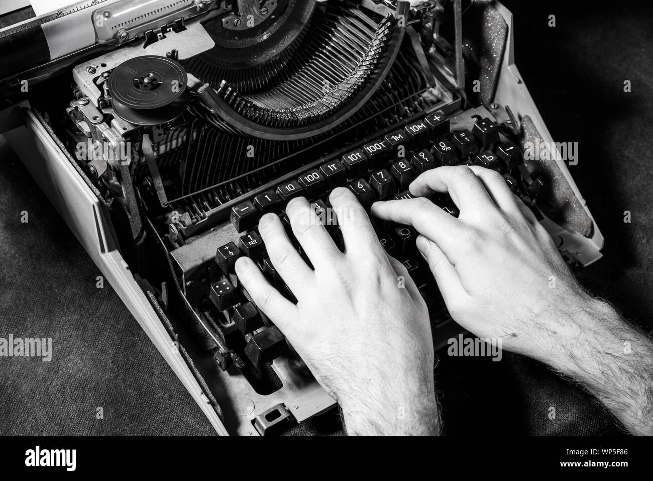 Hands on typewriter hi-res stock photography and images - Alamy