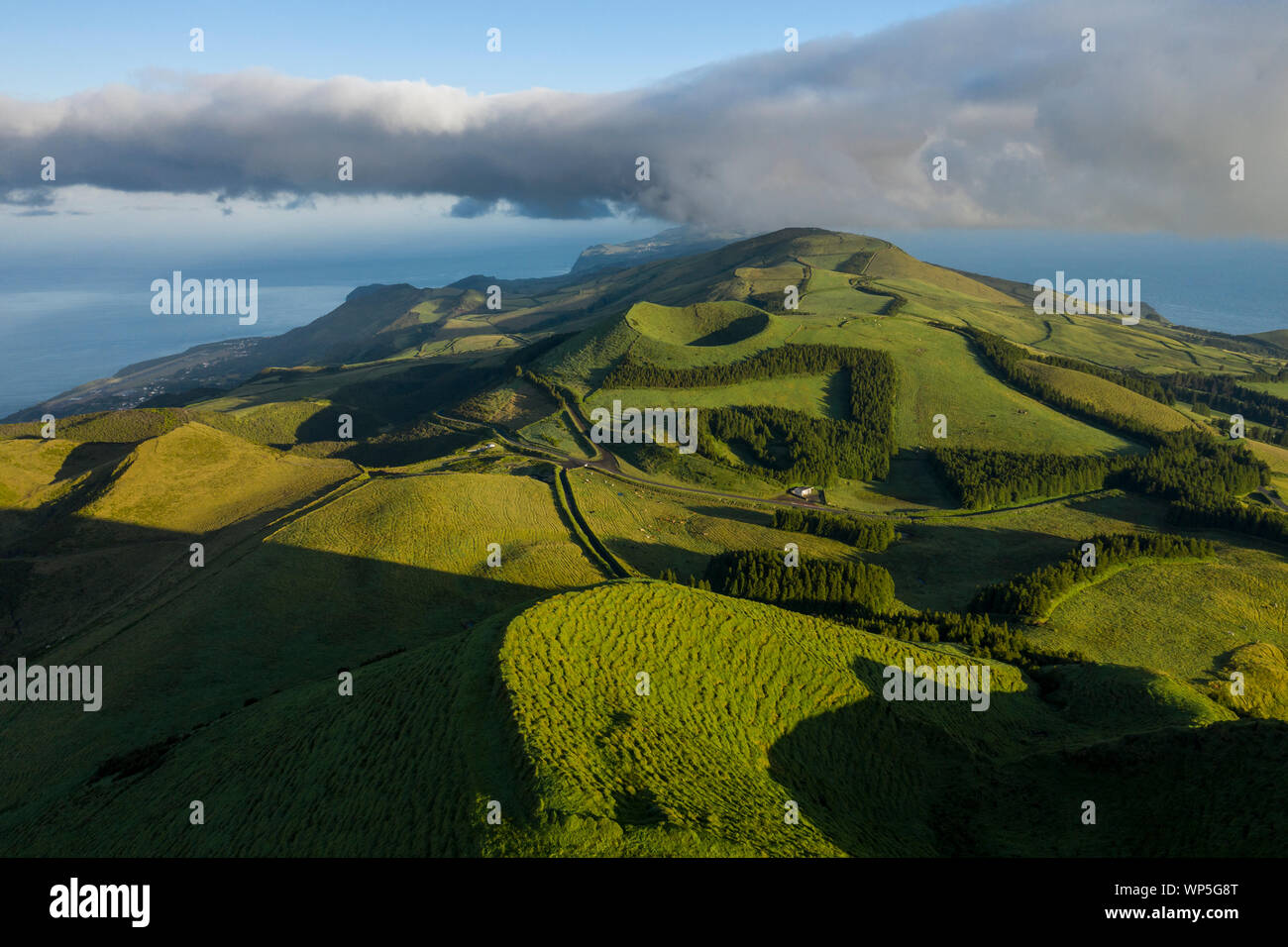 Aerial image showing the volcanic green crater mountain landscape of ...