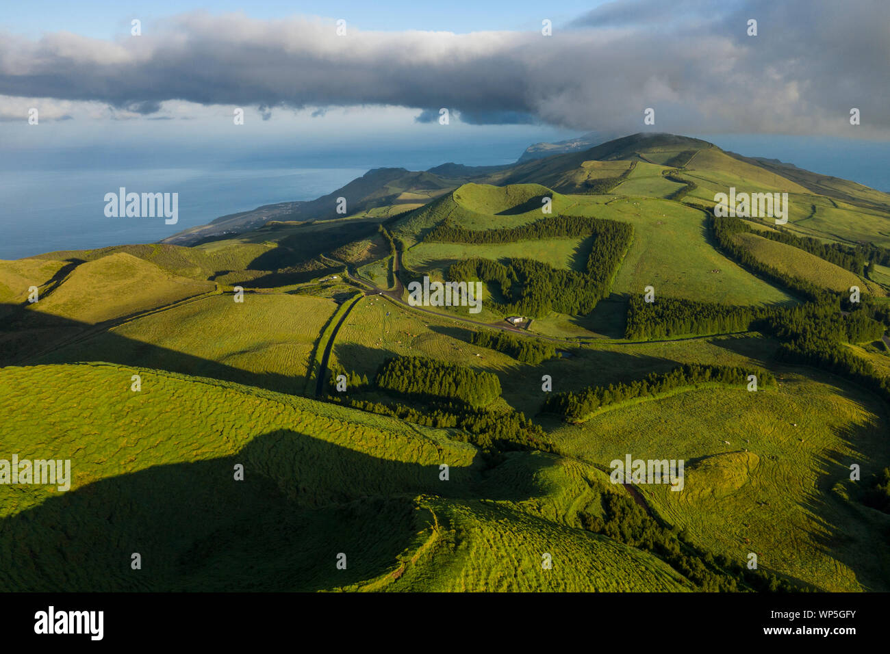 Aerial image showing the volcanic green crater mountain landscape of ...