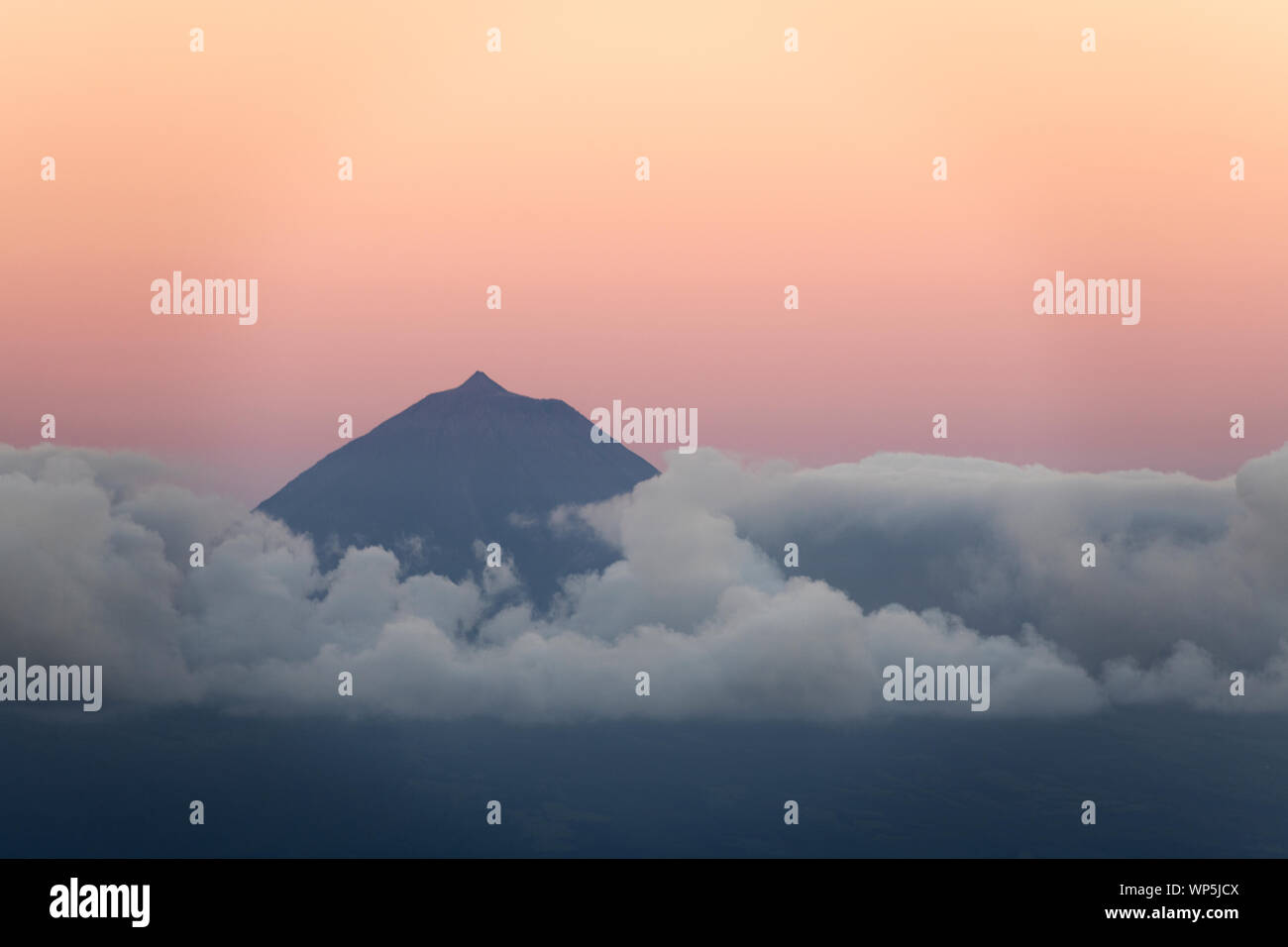 Mount Pico, Ponta do Pico with clouds layer at a beautiful sunrise as ...