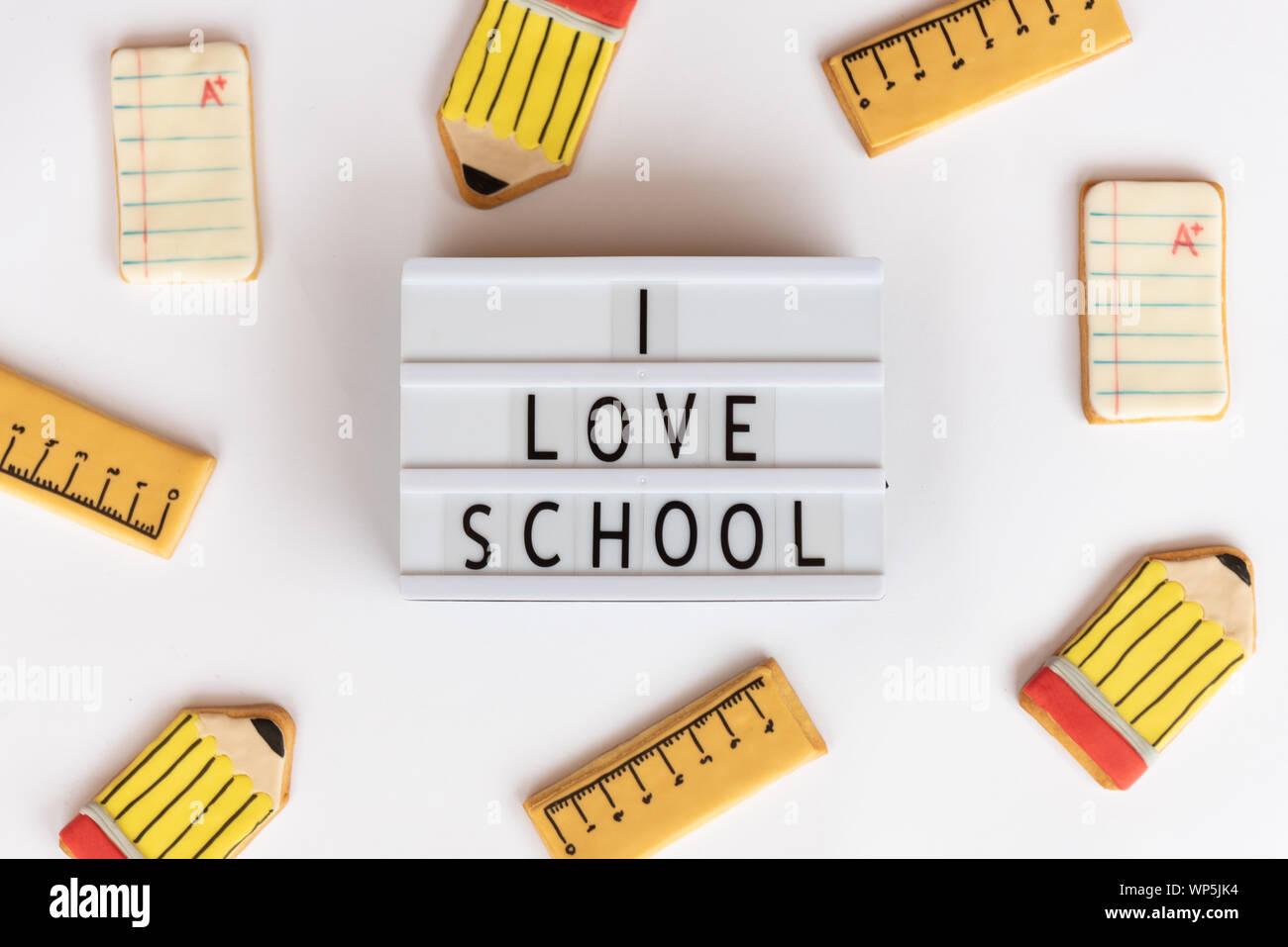 Back to school concept. The text I love school in a lightbox on a white ...