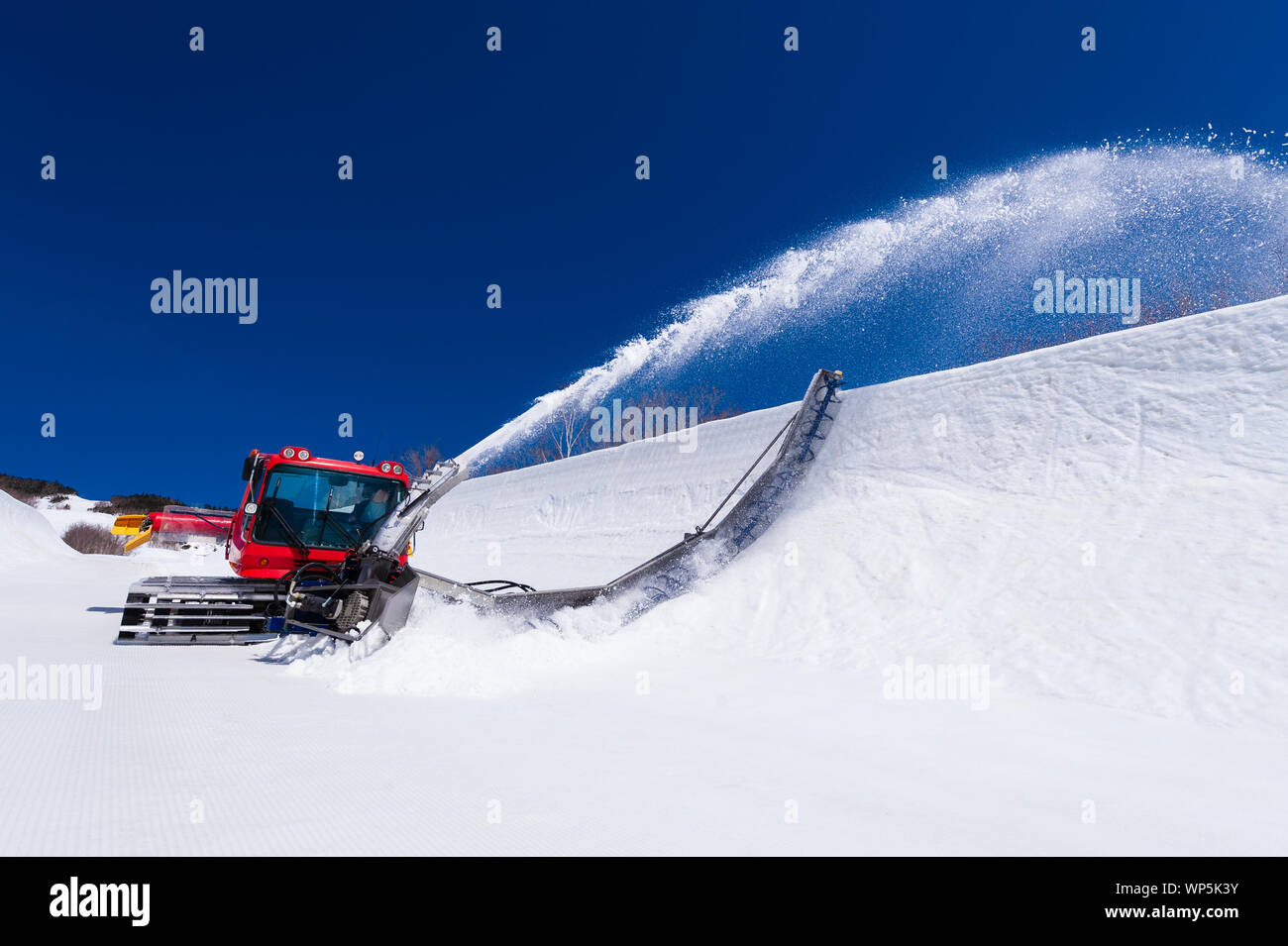 A snowcat cutting a half-pipe, Stowe, Vermont, USA Stock Photo - Alamy