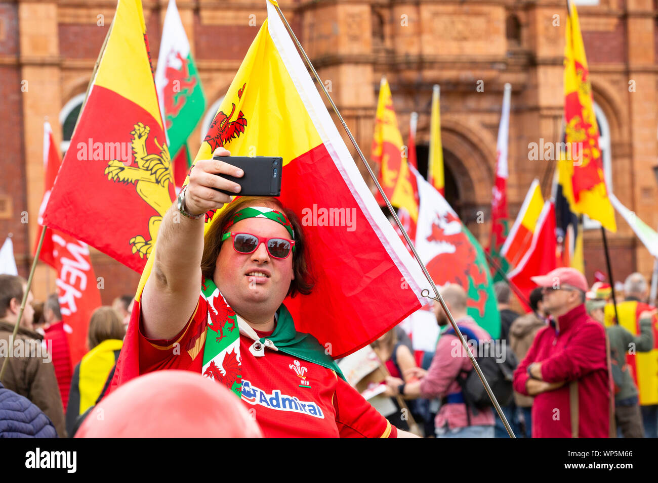 Protesters march for Welsh Independence through the streets of Merthyr ...