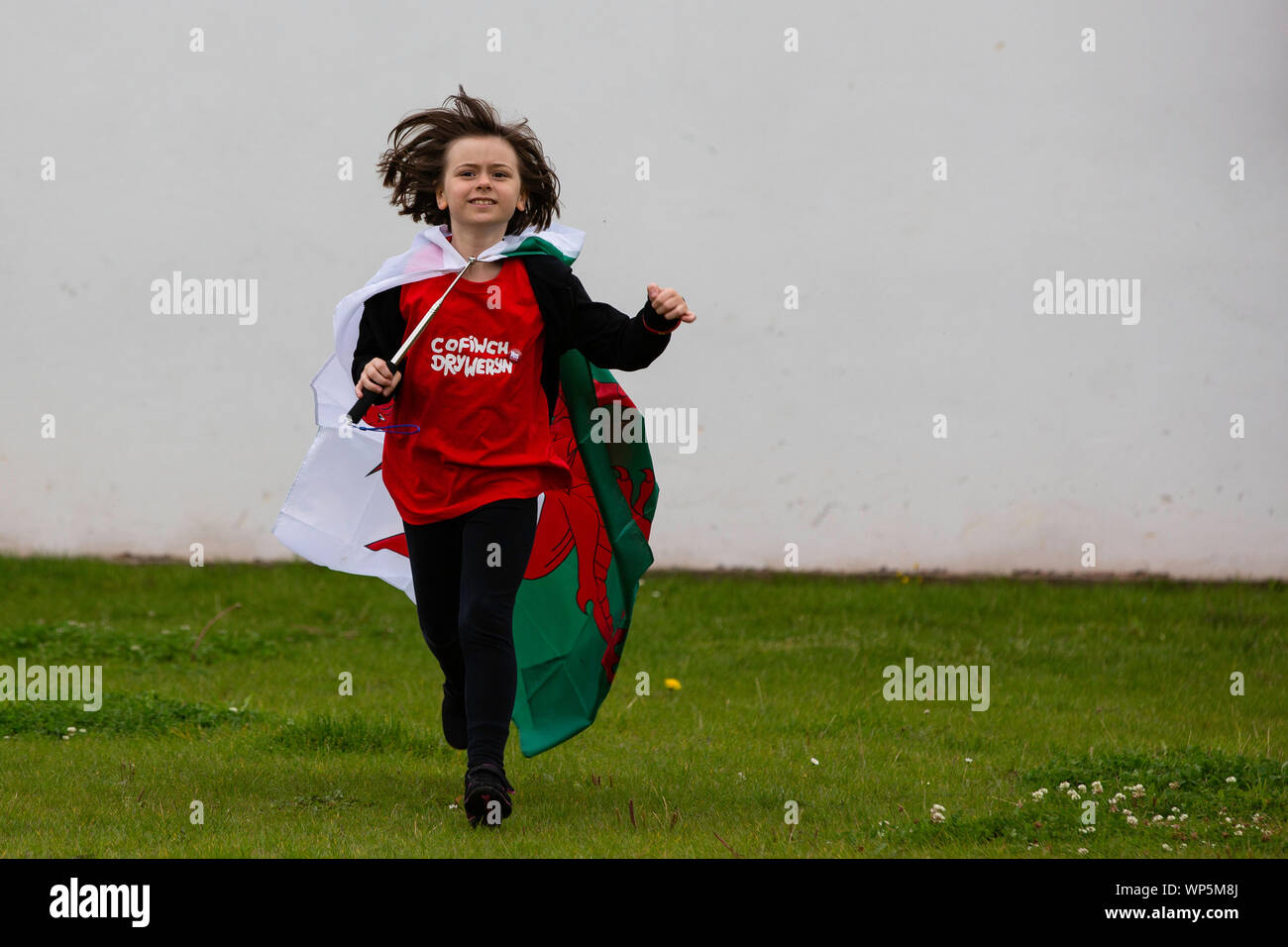 Protesters march for Welsh Independence through the streets of Merthyr ...