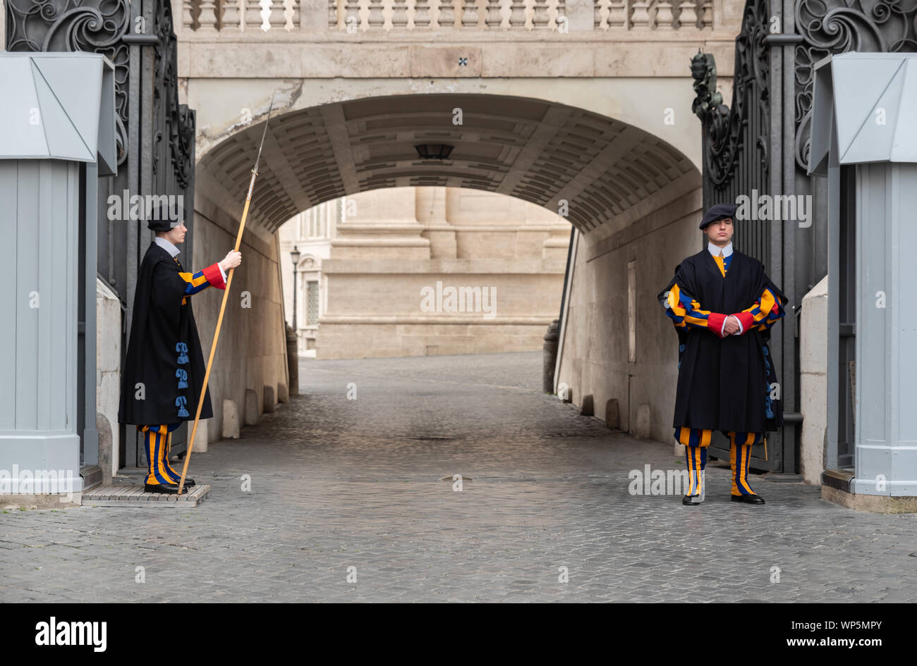 Two pontifical swiss guards at one entrance of the Vatican City Stock ...