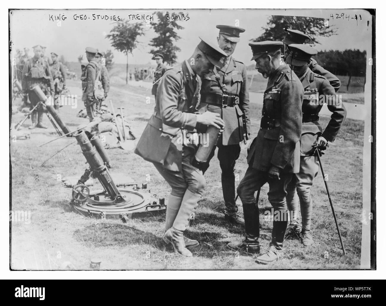 King Geo. studies trench bombs Stock Photo - Alamy