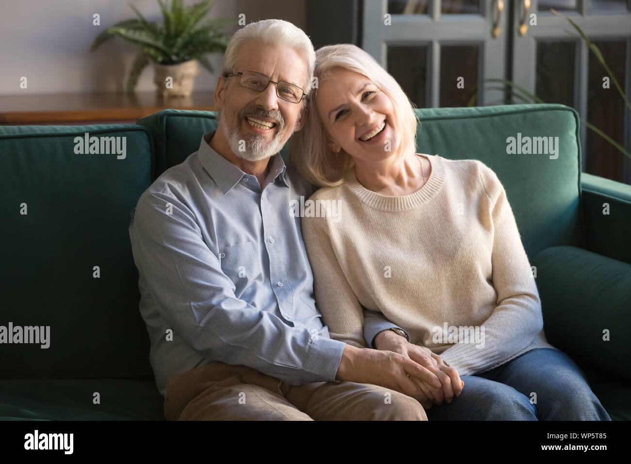 Healthy happy smiling elder family couple portrait Stock Photo - Alamy