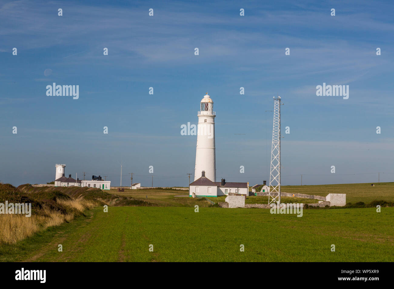 Nash Point lighthouse from the Wales Coast Path overlooking the Bristol ...