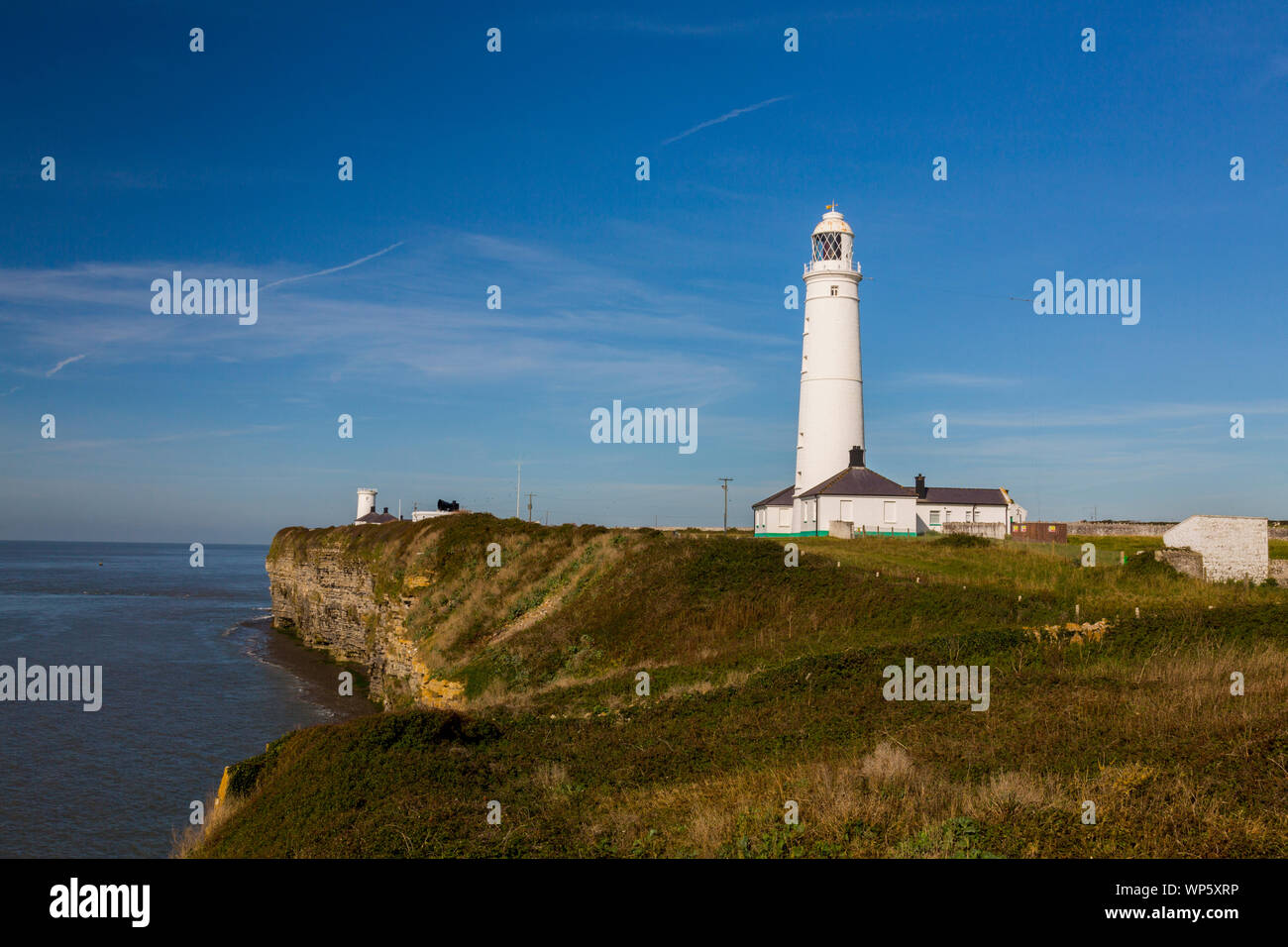 Nash Point lighthouse from the Wales Coast Path overlooking the Bristol ...
