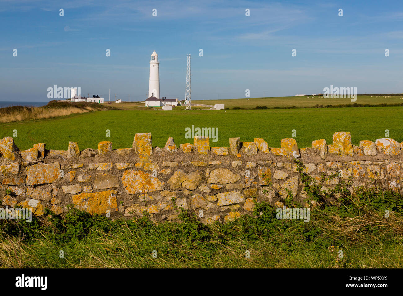 Nash Point lighthouse from the Wales Coast Path overlooking the Bristol ...