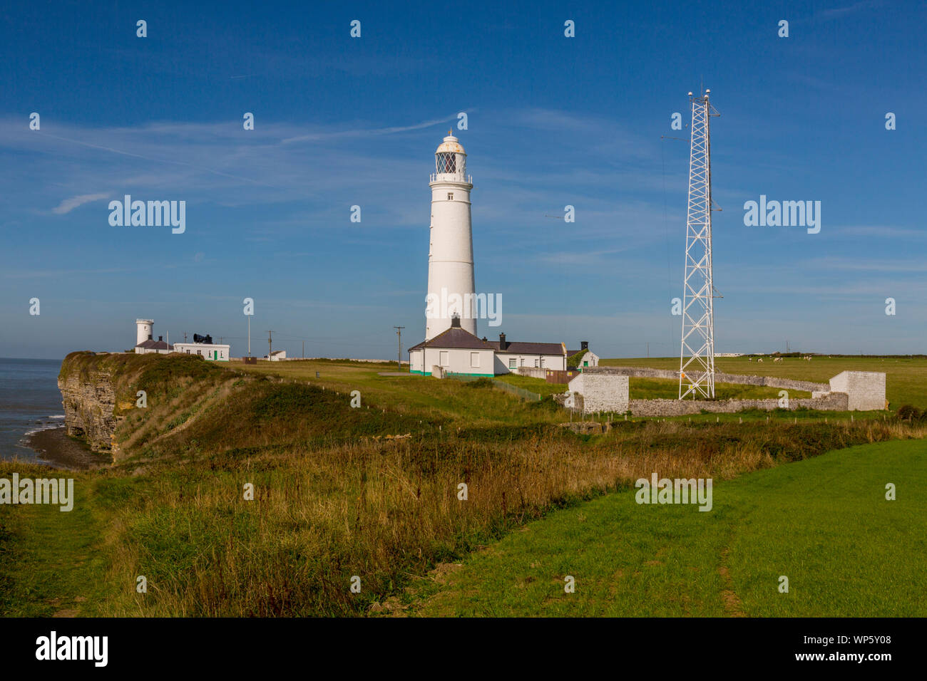 Nash Point lighthouse from the Wales Coast Path overlooking the Bristol ...