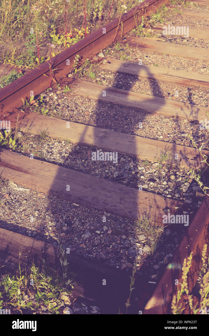 Man shadow on railroad path. Mystic traveler long way background Stock ...