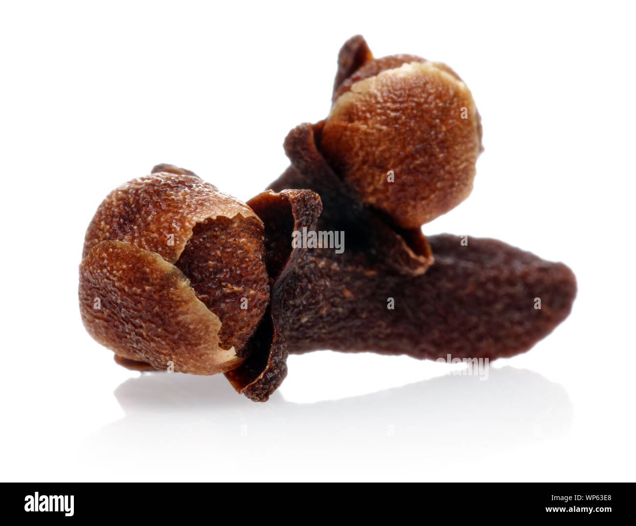 Dry clove buds isolated on white background Stock Photo - Alamy