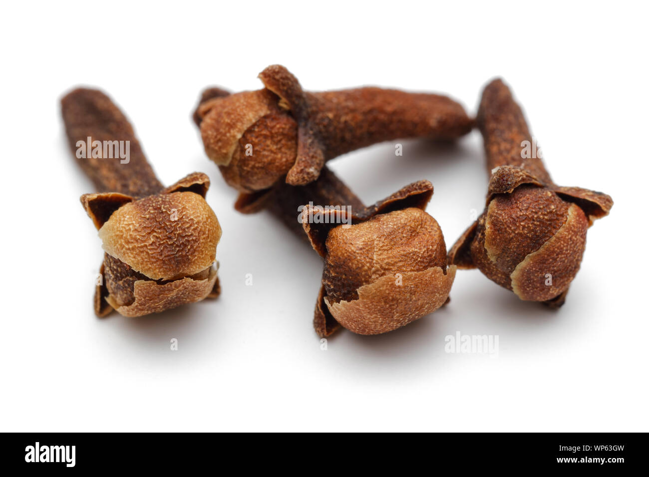 Dry clove buds isolated on white background Stock Photo - Alamy