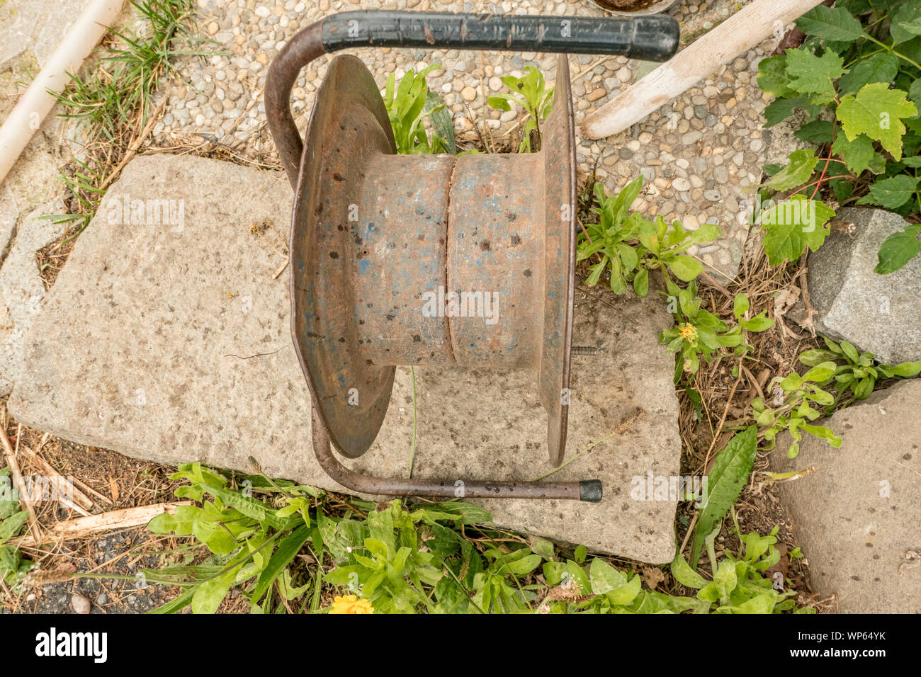 empty old cable reel rusty and dirty Stock Photo - Alamy