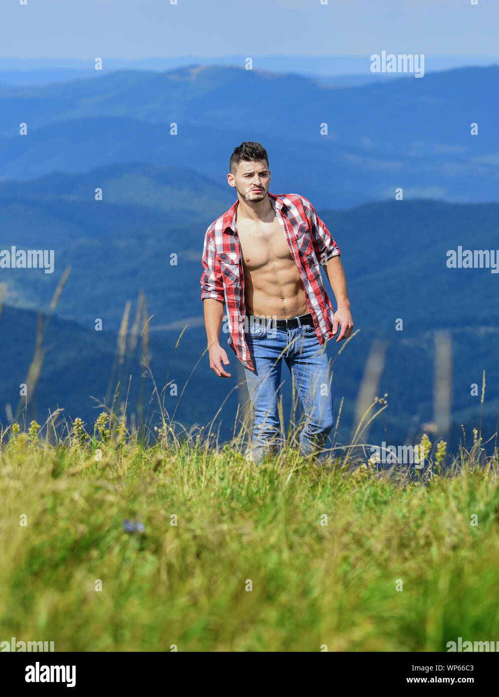 Hiking concept. Muscular tourist walk mountain hill. Power of nature ...