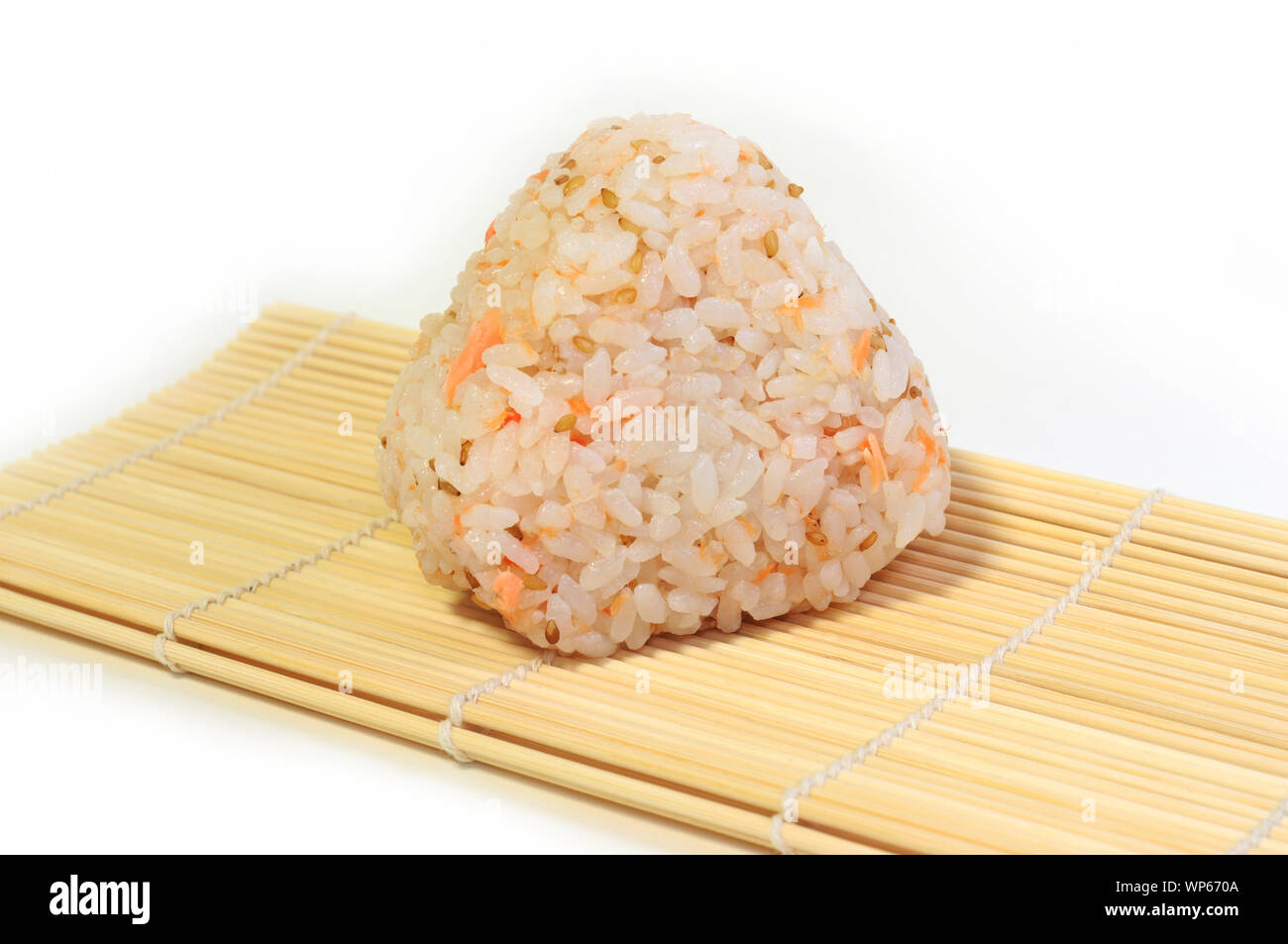 rice ball on cutting board white background Stock Photo - Alamy