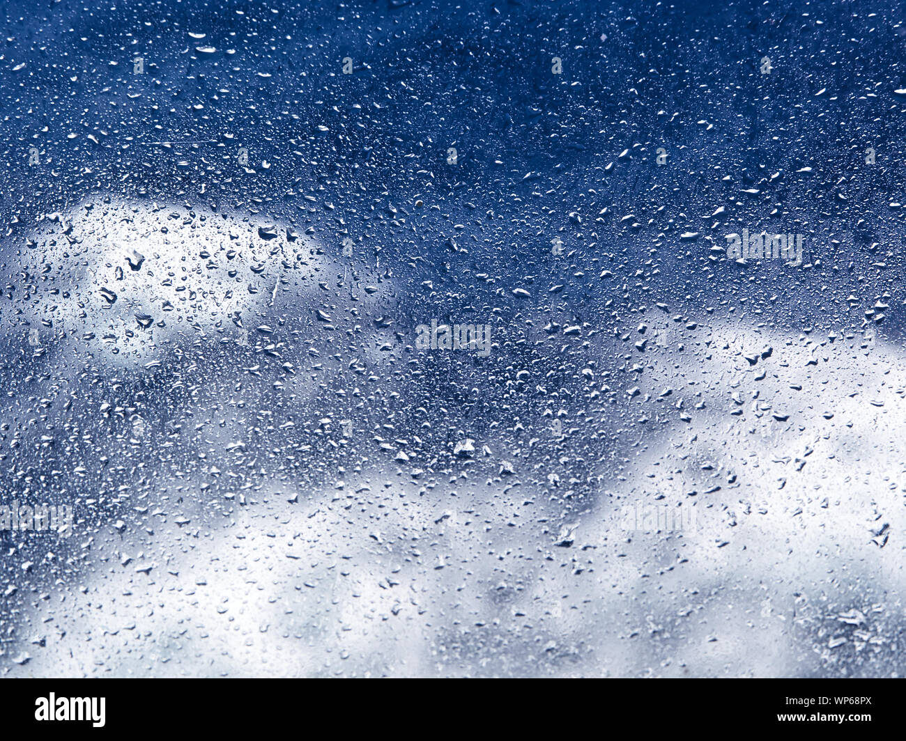 Water drops on window glass, sea and horizon line behind glass Stock ...