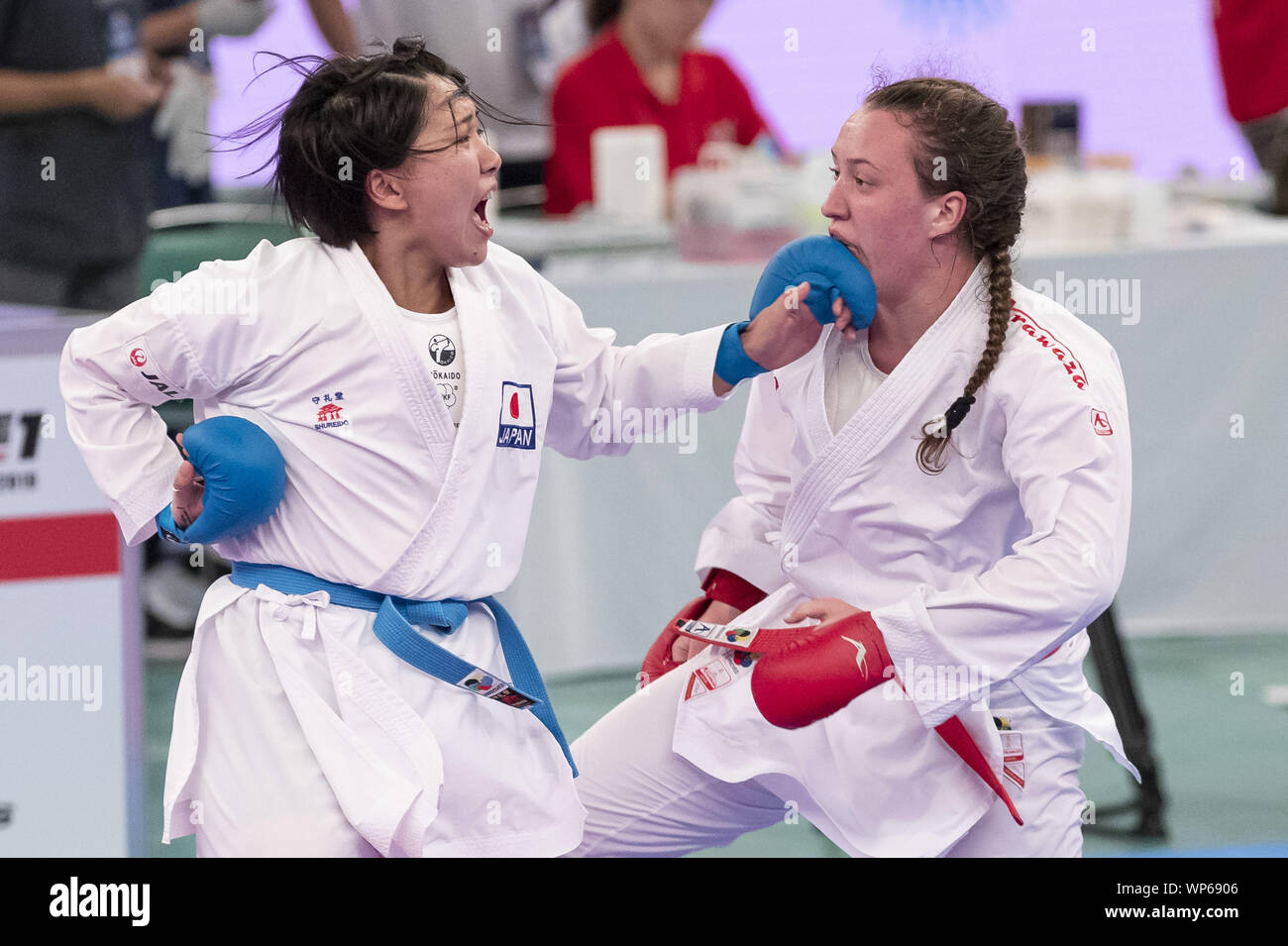 Tokyo, Japan. 7th Sep, 2019. Sofya Berultseva of Kazakhstan (red ...