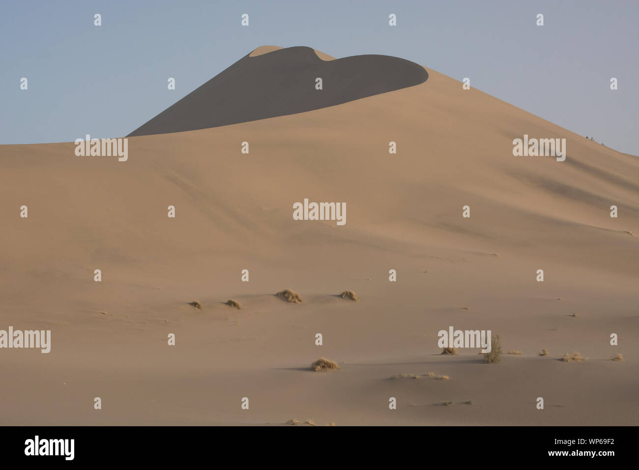 Giant dune at the Singing Sand Dunes Geopark, Dunhuang, China Stock ...