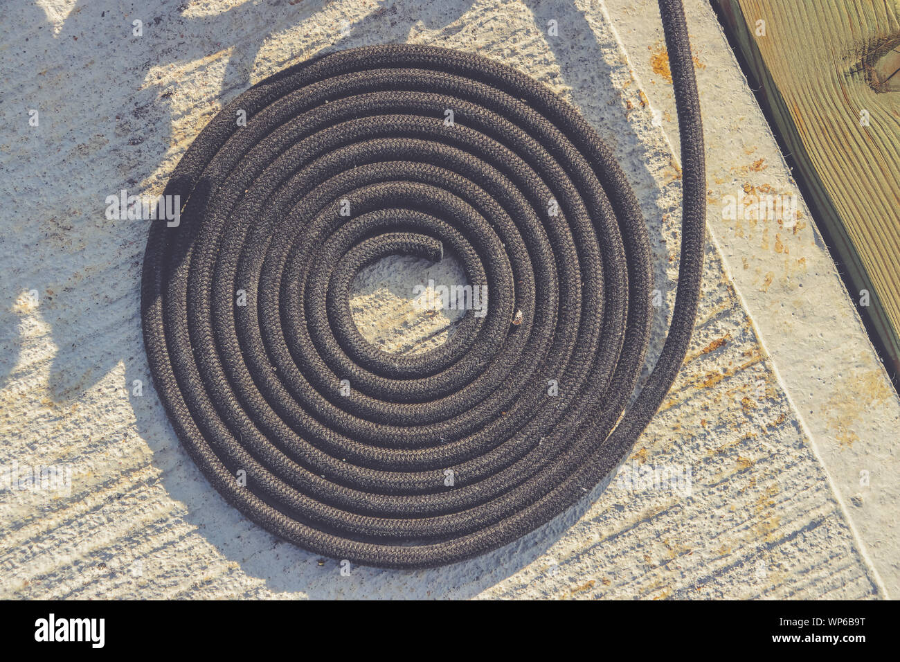 Swirl rope vessel background. Sailing marine spiral rope on the pier ...