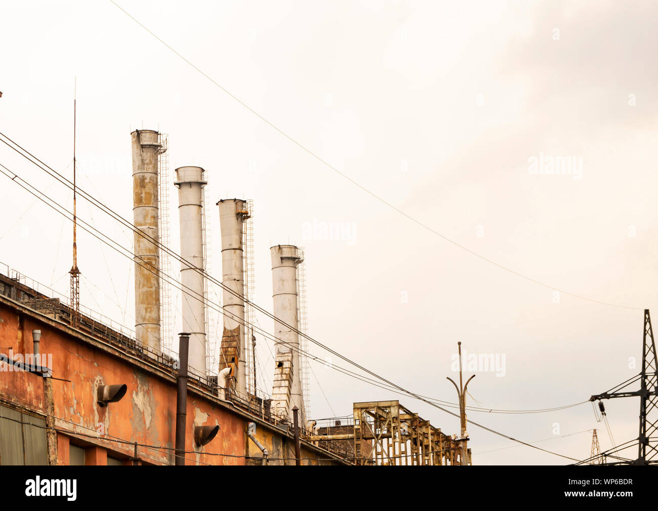 Old factory with pipes - industrial background Stock Photo - Alamy