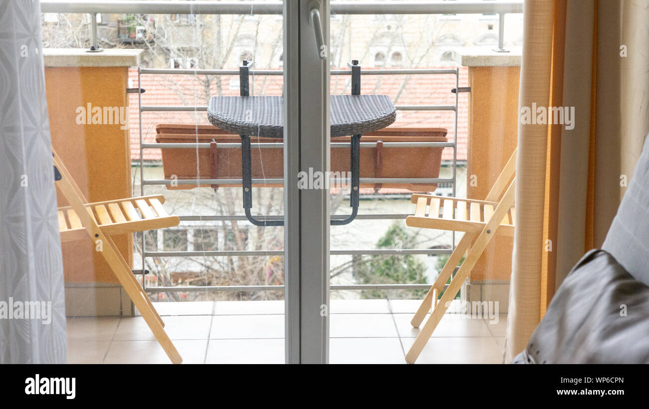 patio from inside with chairs Stock Photo - Alamy