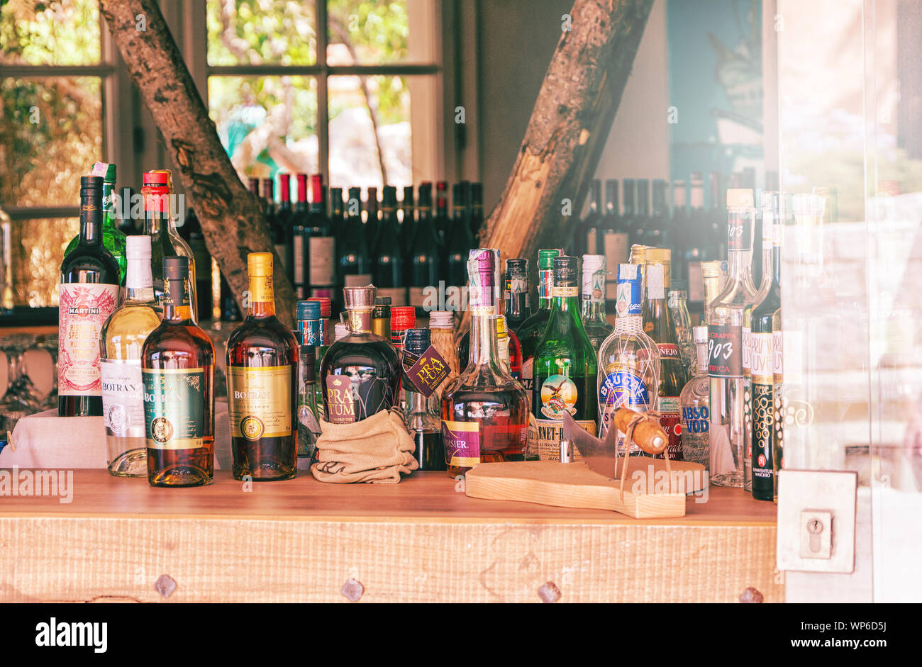 PORTO CERVO, ITALY - AUGUST 13 2019 Alcoholic beverage on bar counter ...