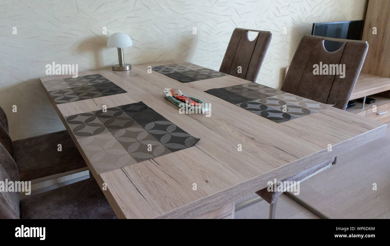 cozy dining table with lamp Stock Photo - Alamy