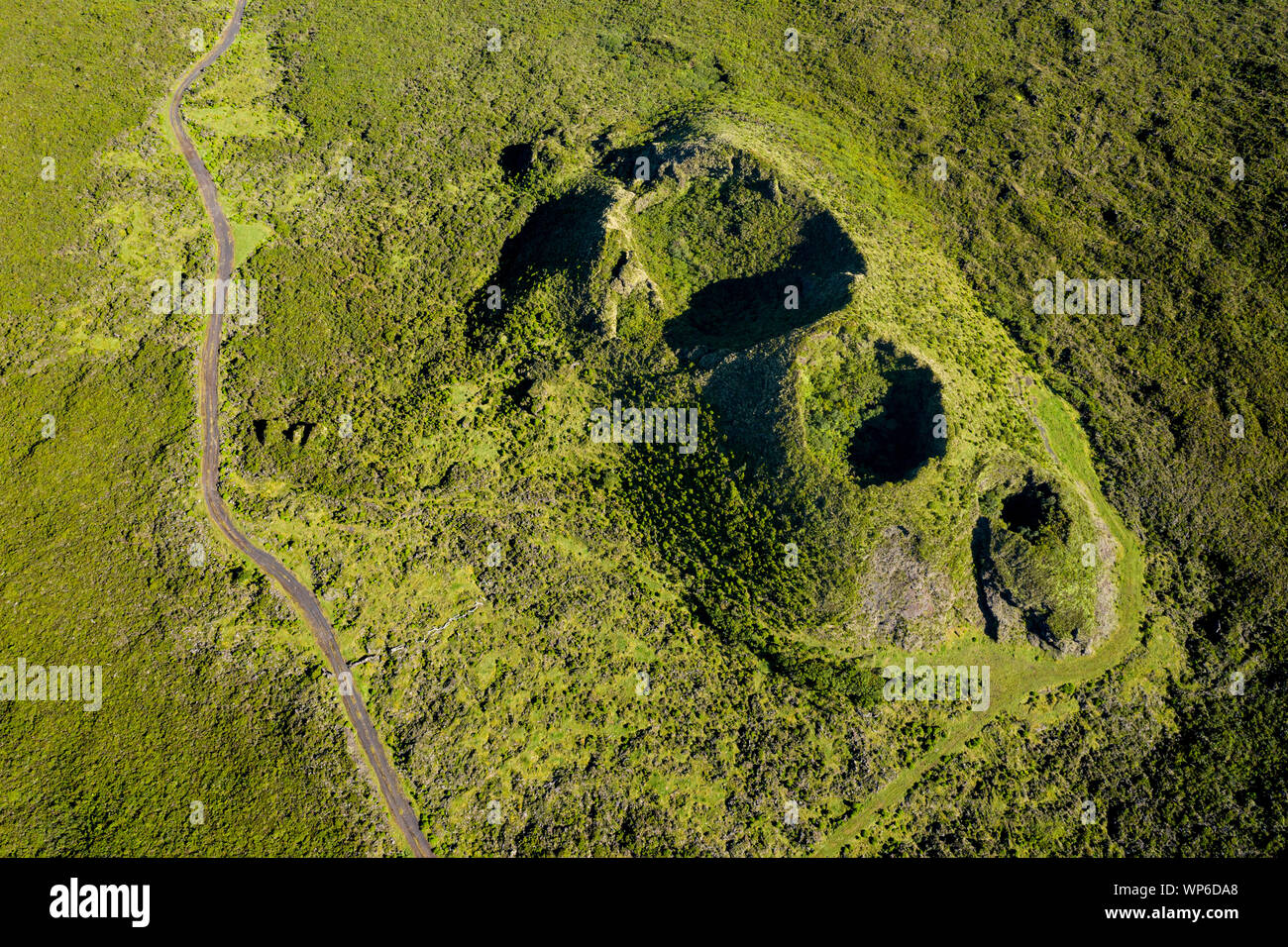 Aerial image of typical green volcanic caldera crater landscape with ...