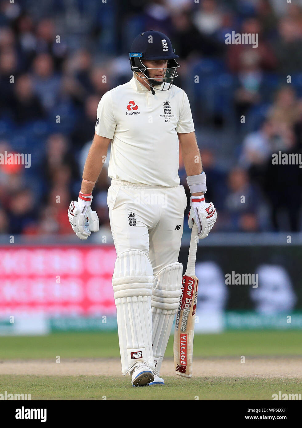 England's Joe Root looks dejected after being dismissed by Australia's ...