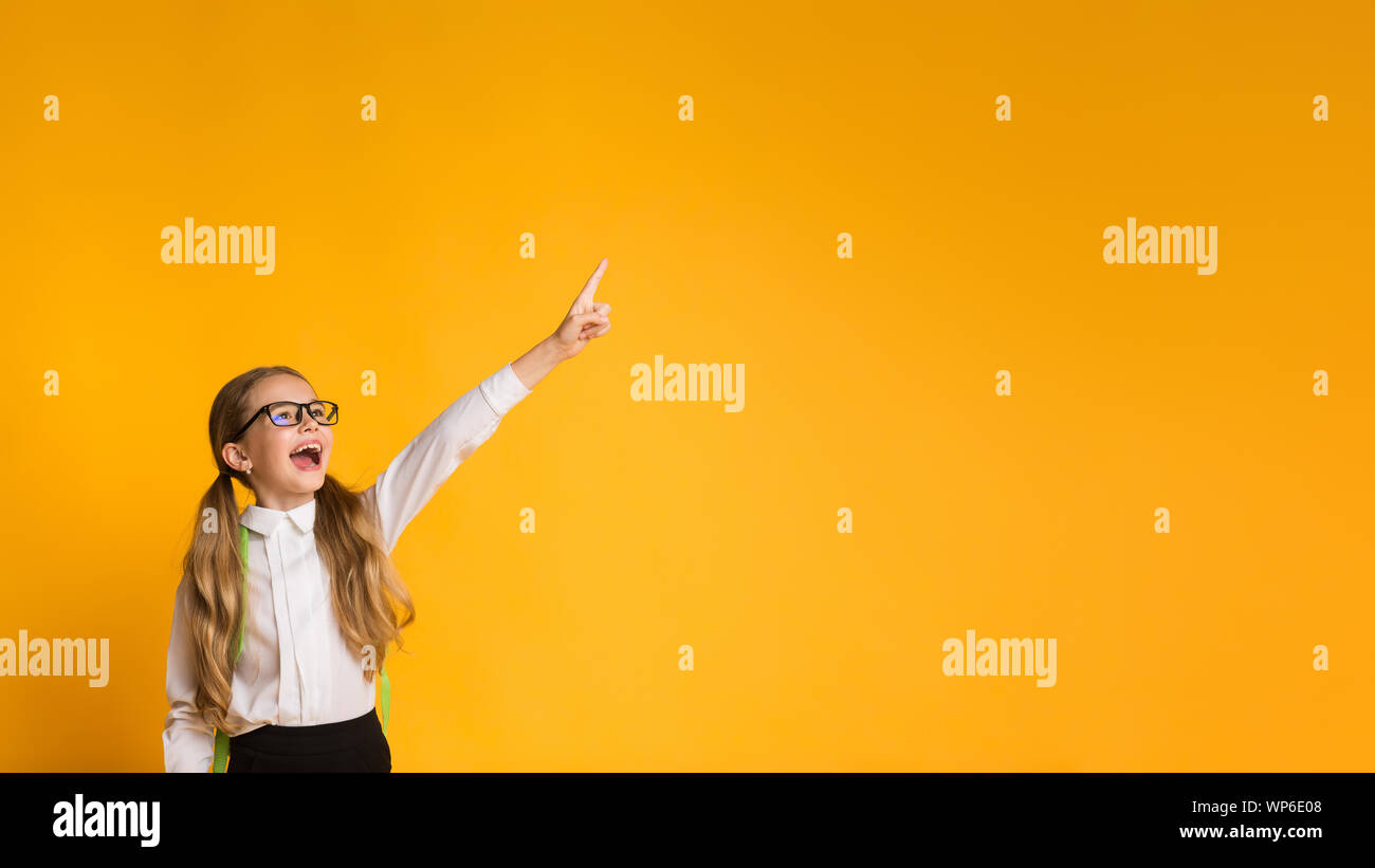 Elementary Student Girl Pointing Finger Up, Studio Shot, Panorama Stock ...