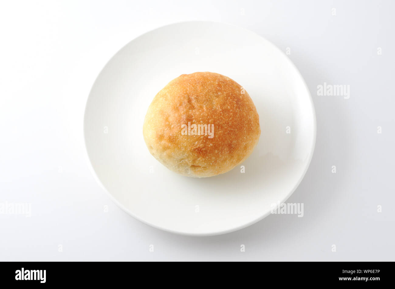 round bread isolated on white background Stock Photo - Alamy