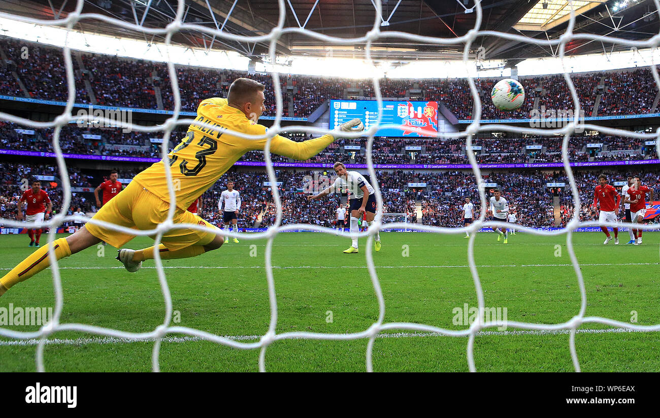England's Harry Kane scores (centre) his side's fourth goal of the game ...