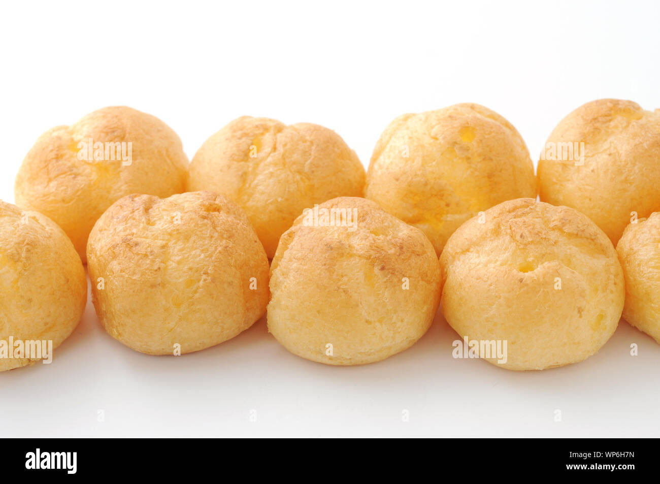 cream puffs closeup isolated on white background Stock Photo - Alamy